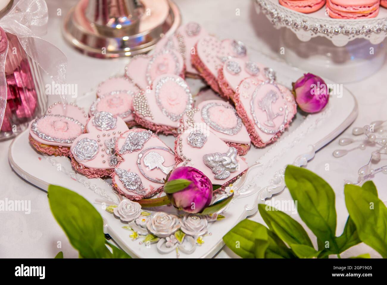 Delicious desserts at the wedding candy bar in the buffet area: cookies ...