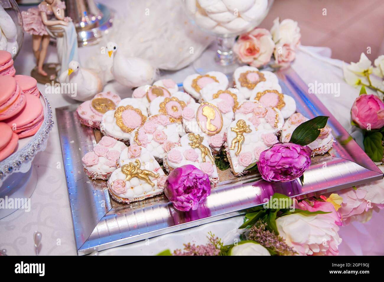 Delicious desserts at the wedding candy bar in the buffet area: cookies ...