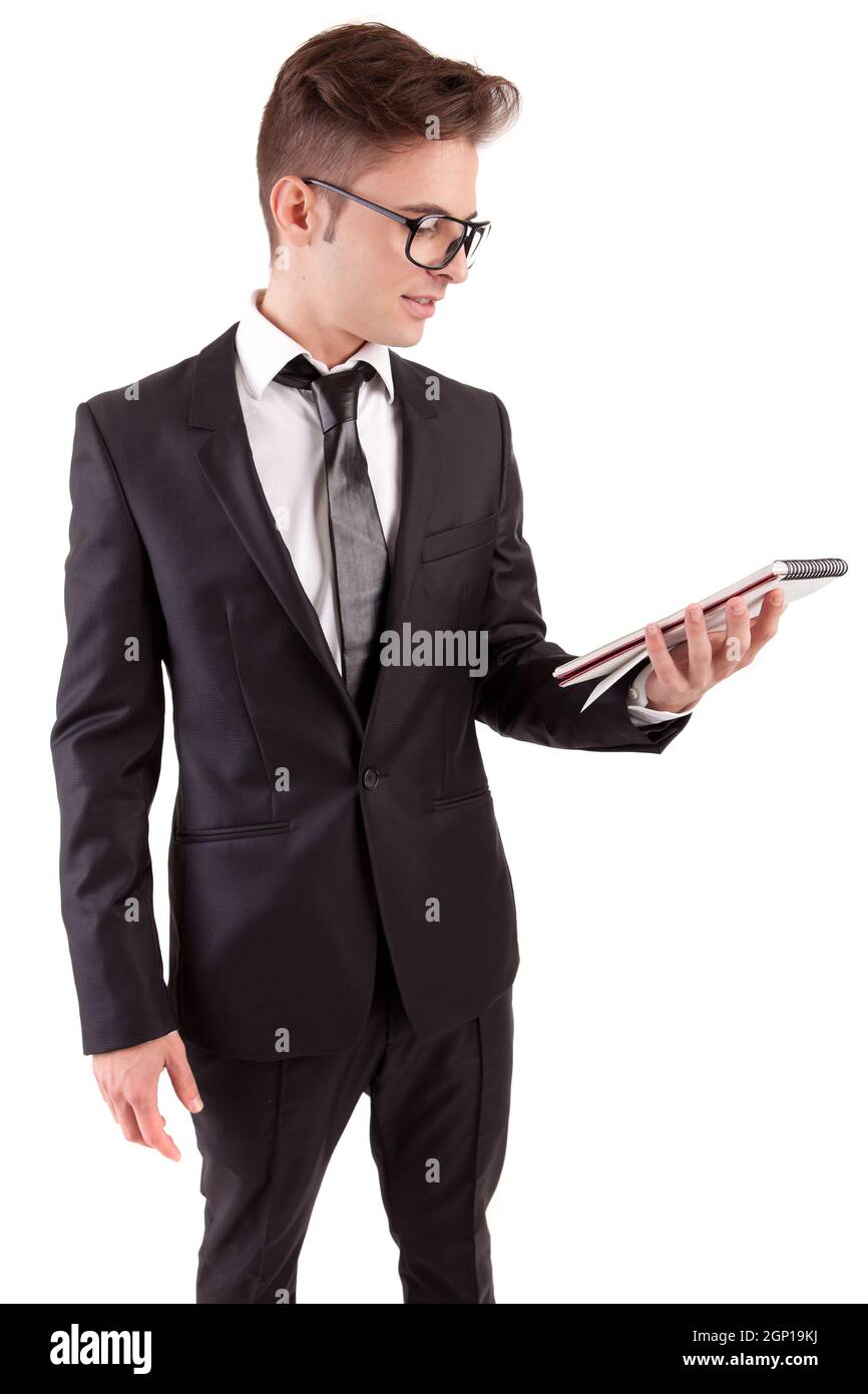 Engineer reading plan, isolated over white background Stock Photo - Alamy