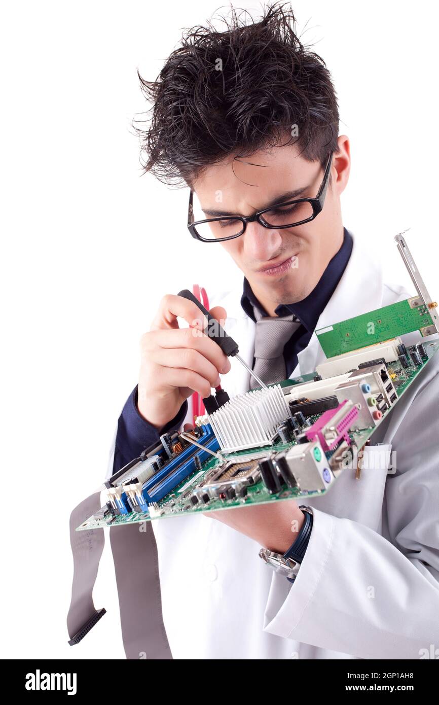 Computer engineer working on an old motherboard Stock Photo - Alamy