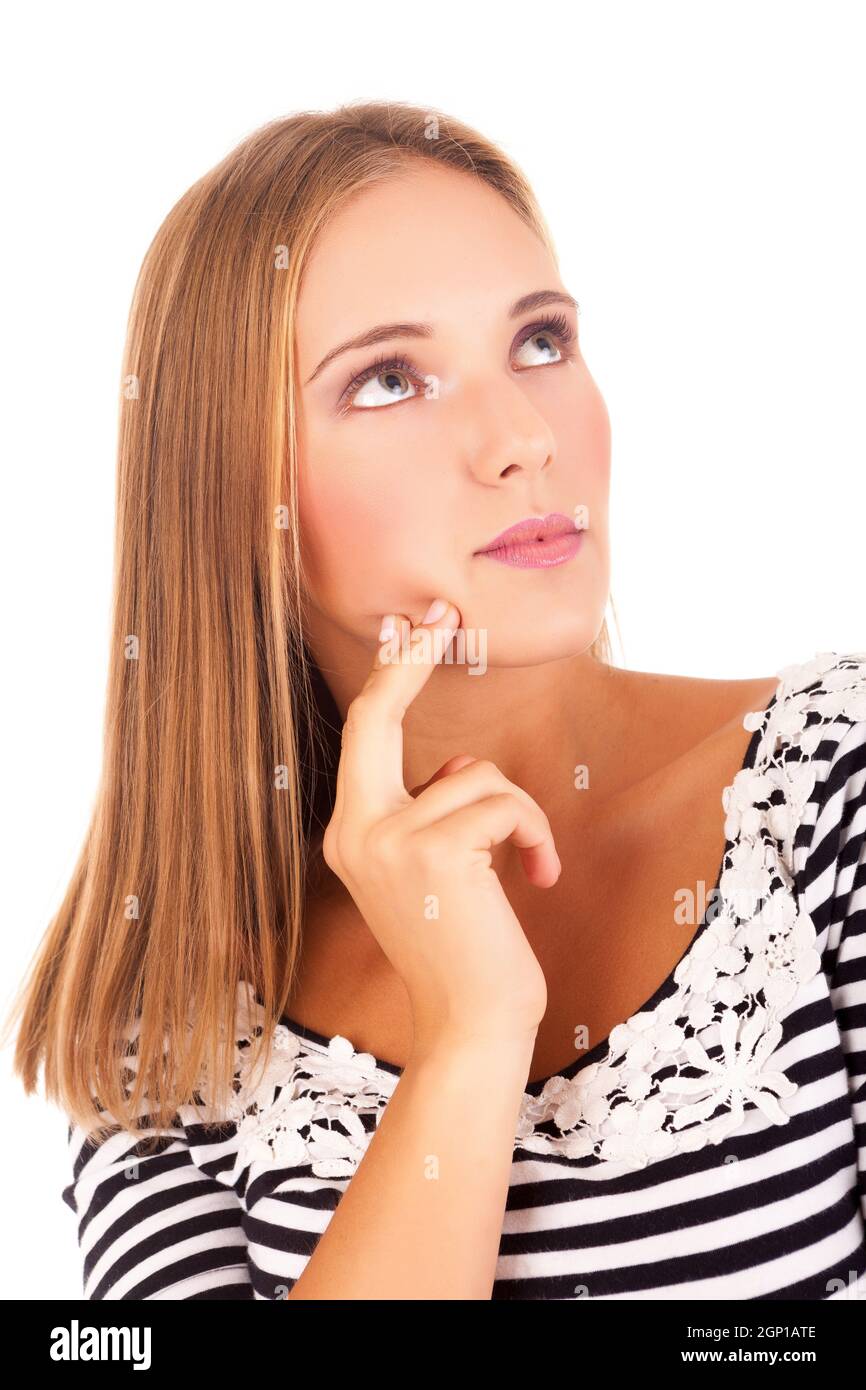 A portrait of a young woman trying to make a decision over white ...