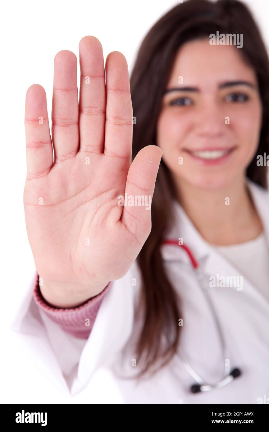 Young nurse making stop sign Stock Photo - Alamy