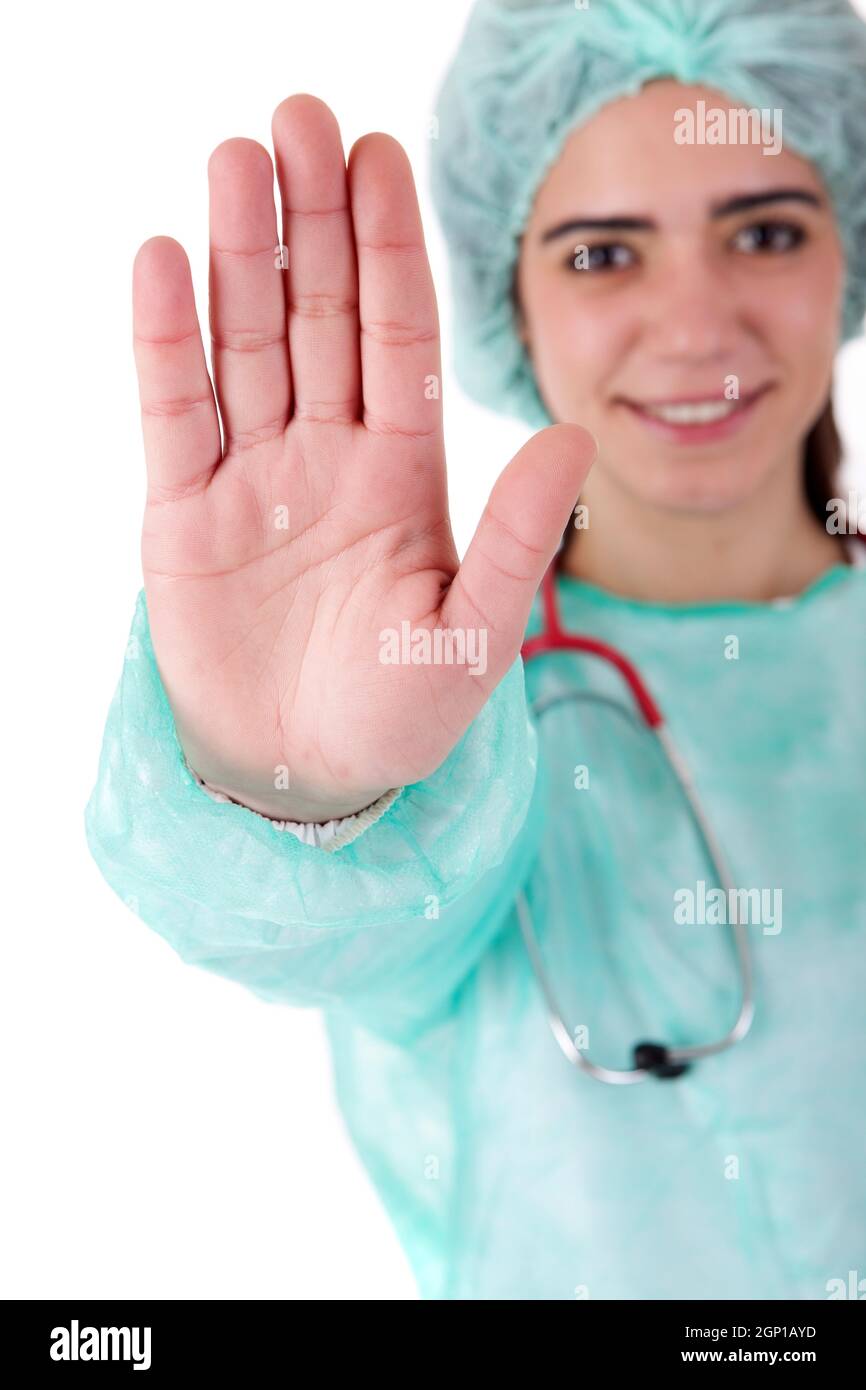 Young nurse making stop sign Stock Photo - Alamy