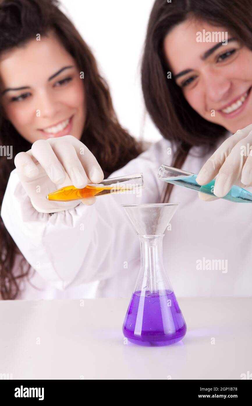 Team of young scientists at laboratory Stock Photo - Alamy