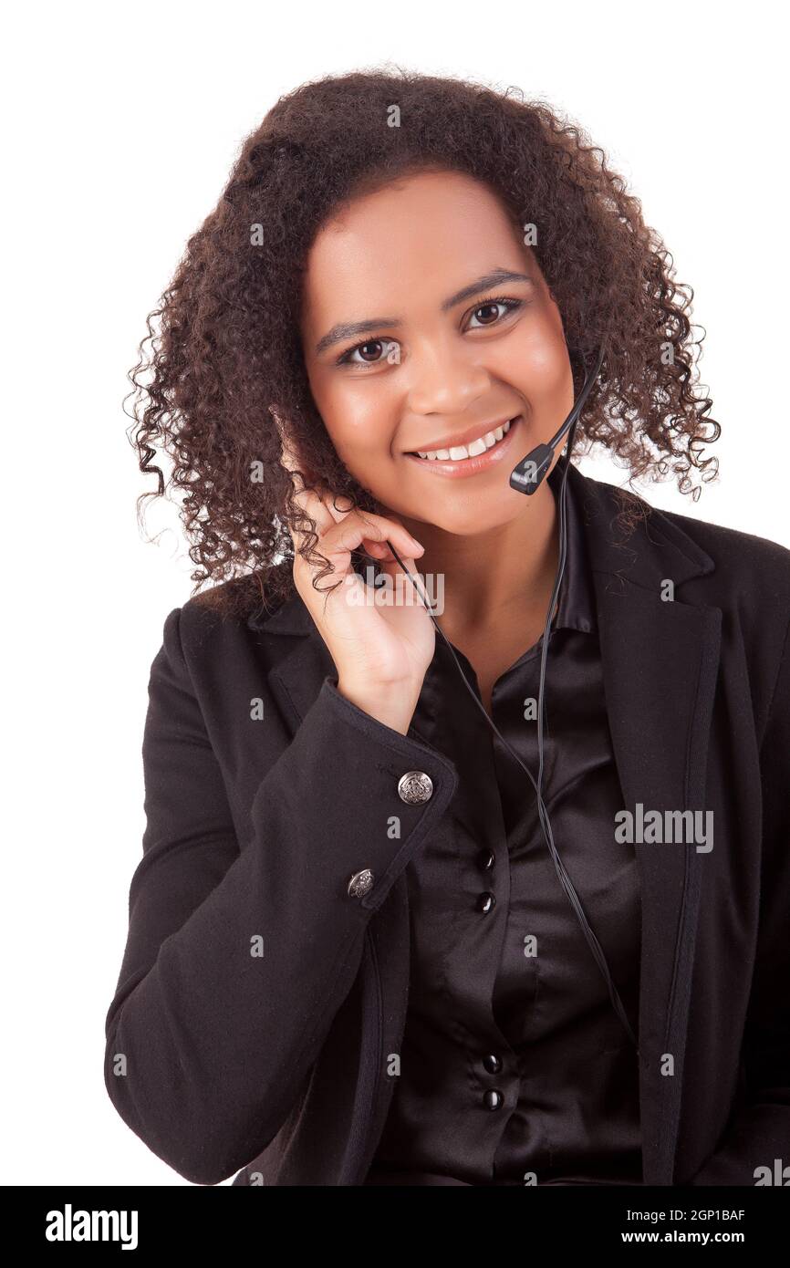 Friendly young beautiful telephone operator at work Stock Photo - Alamy