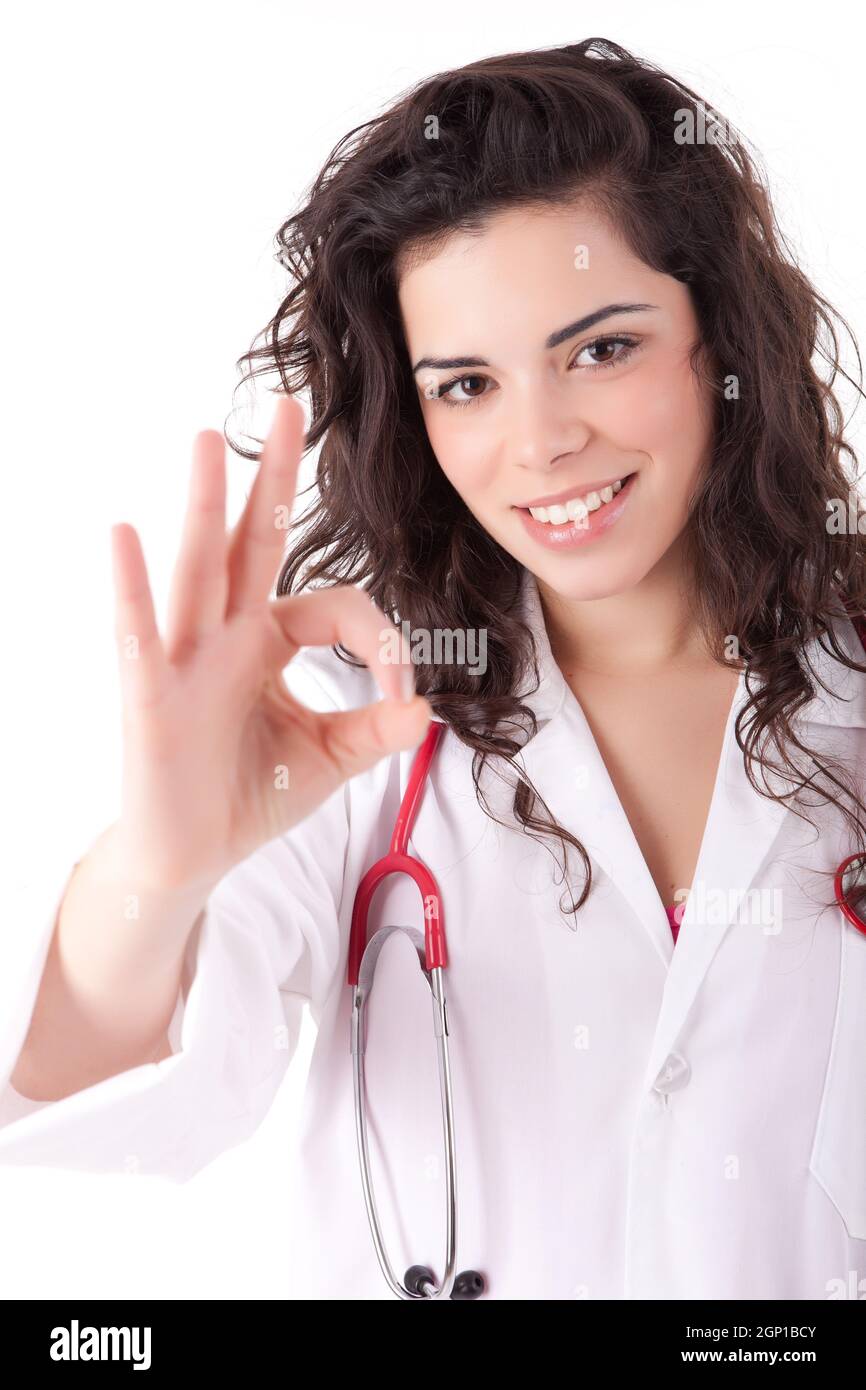 Young doctor signaling ok Stock Photo - Alamy