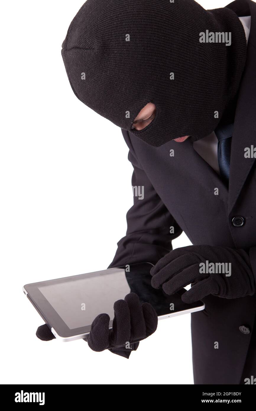 Disguised computer hacker hi-res stock photography and images - Alamy
