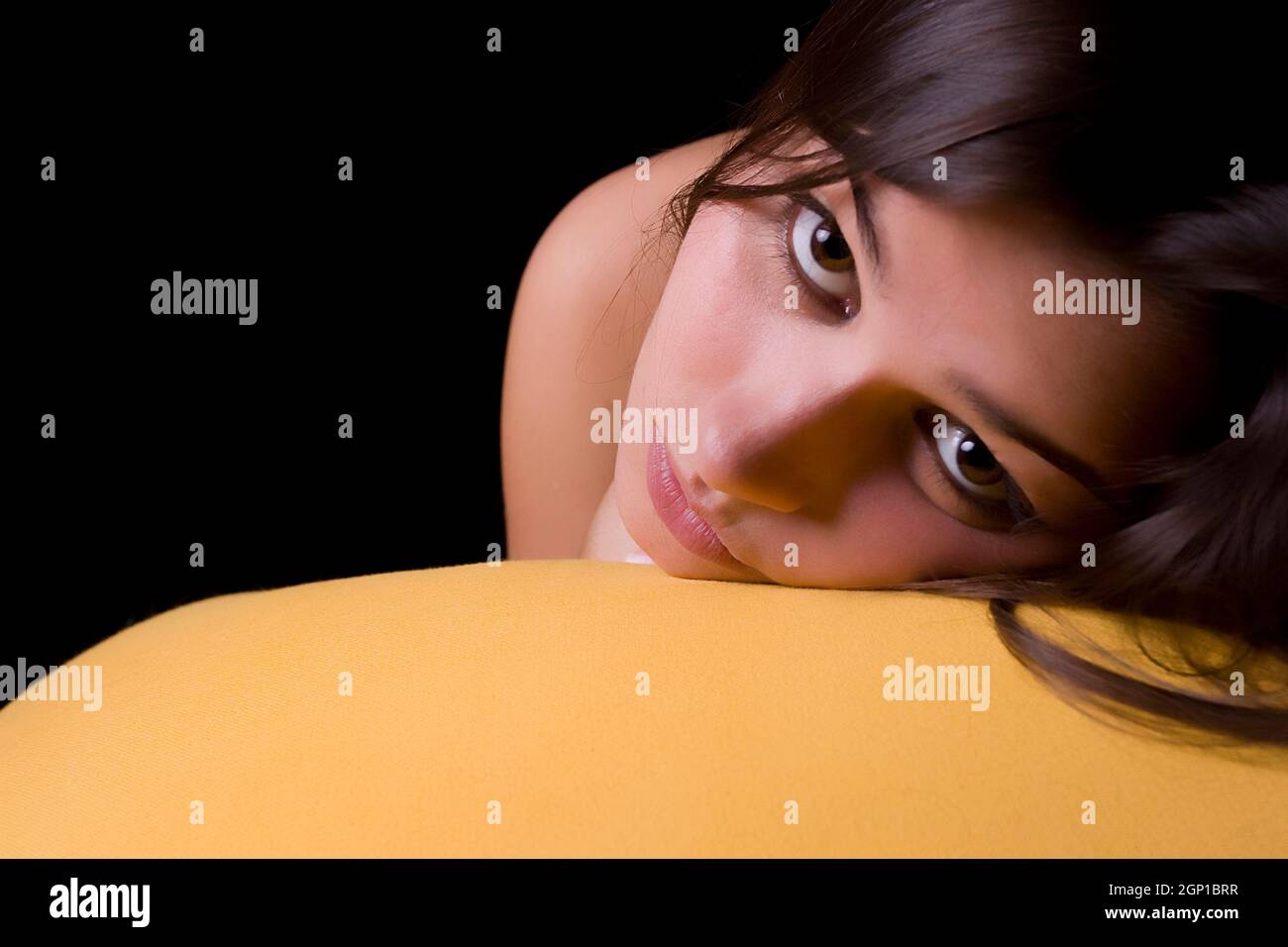 Young girl low key portrait - isolated on black Stock Photo - Alamy