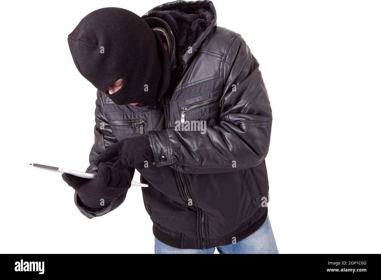Computer hacker with white laptop Stock Photo - Alamy