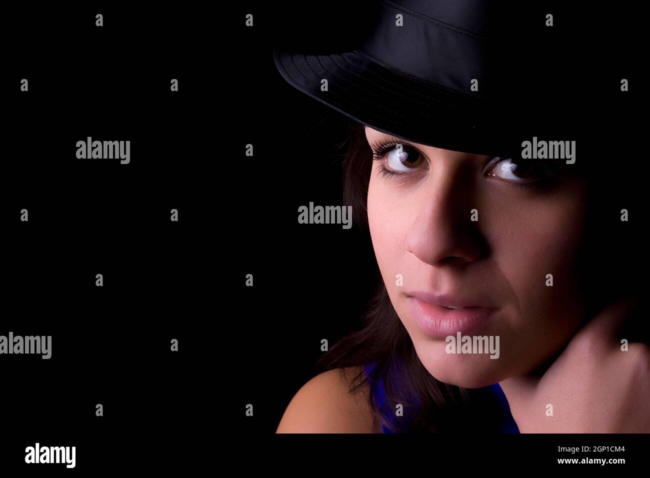 Low key portrait of a beautiful woman Stock Photo - Alamy