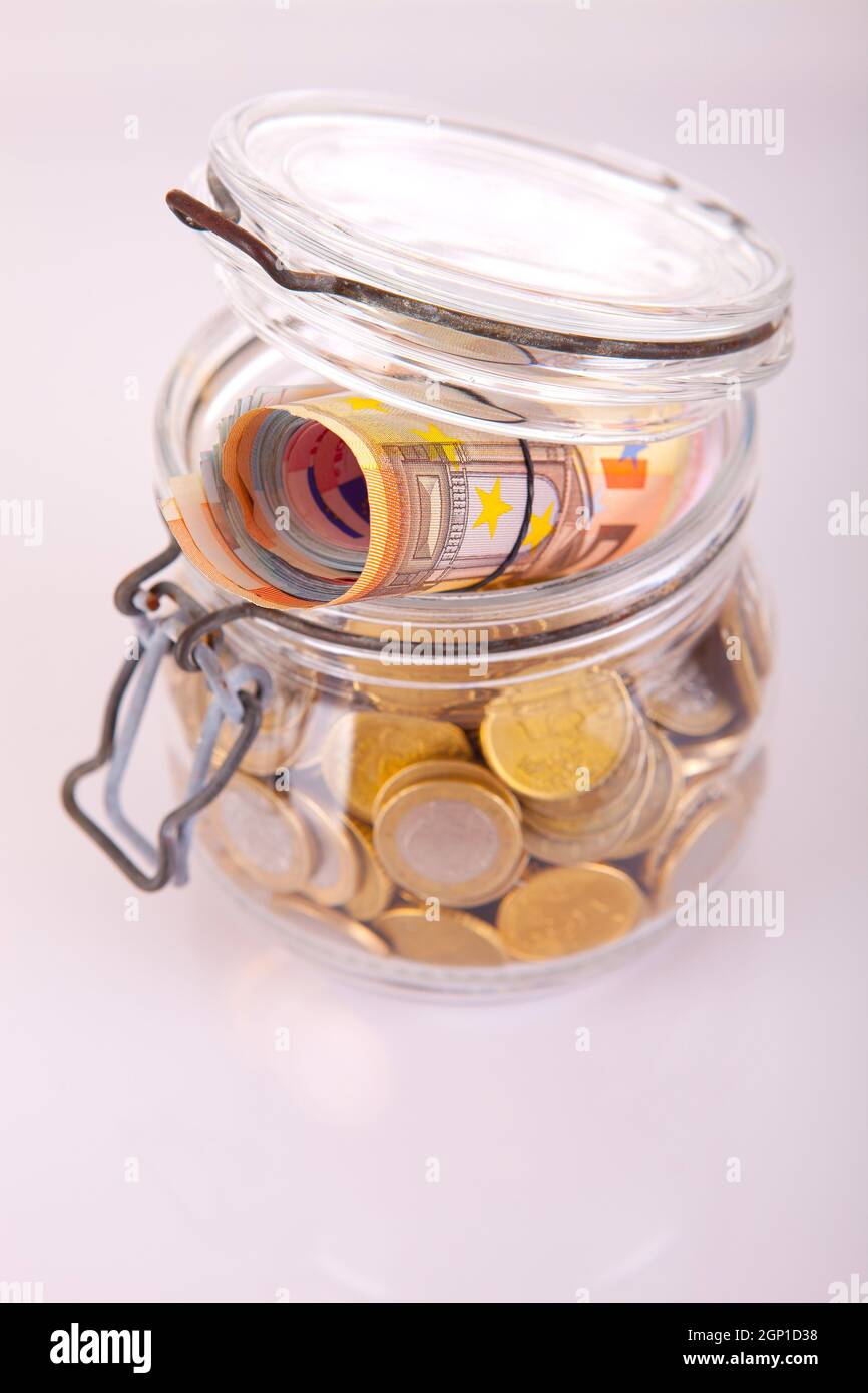 Money jar full hi-res stock photography and images - Alamy