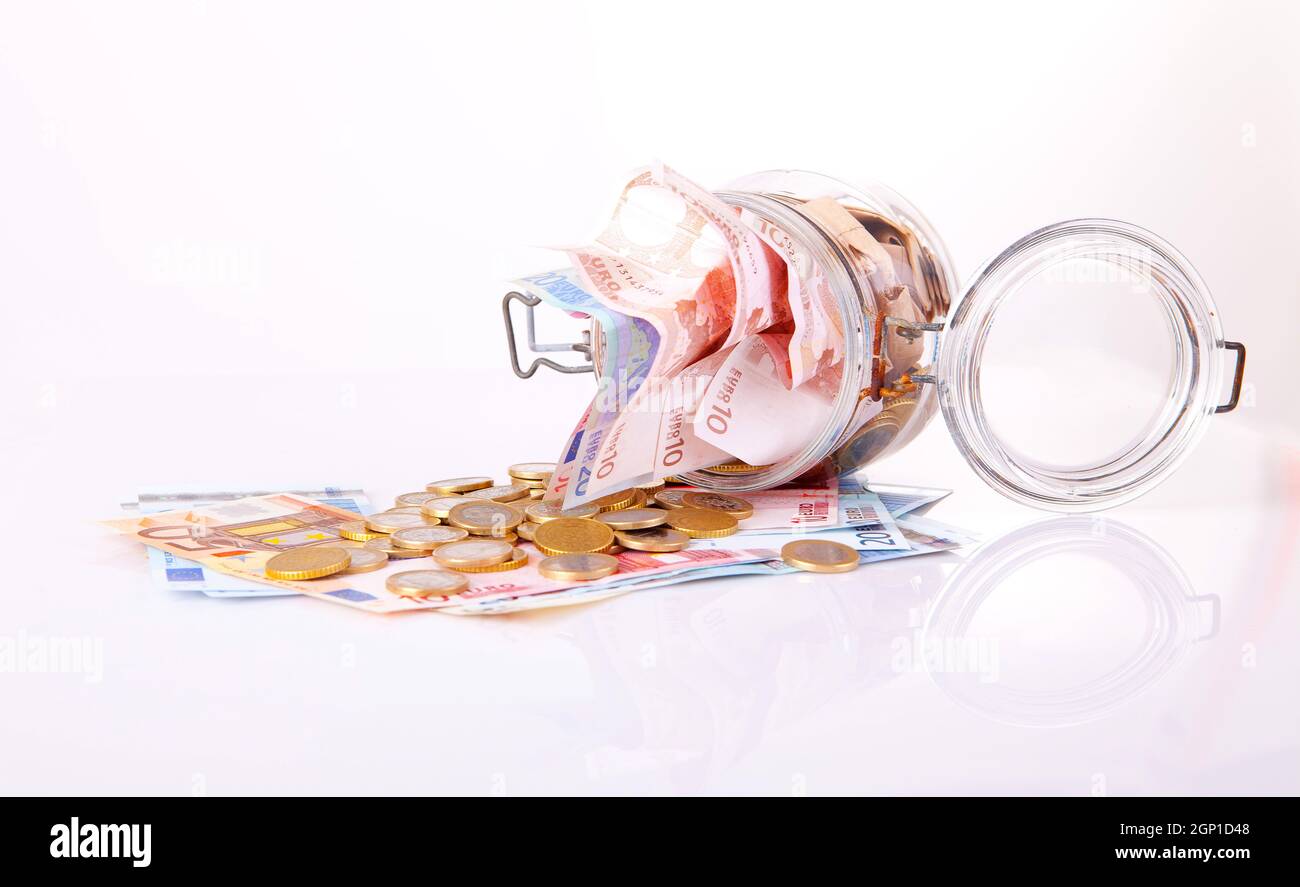 Money jar full hi-res stock photography and images - Alamy