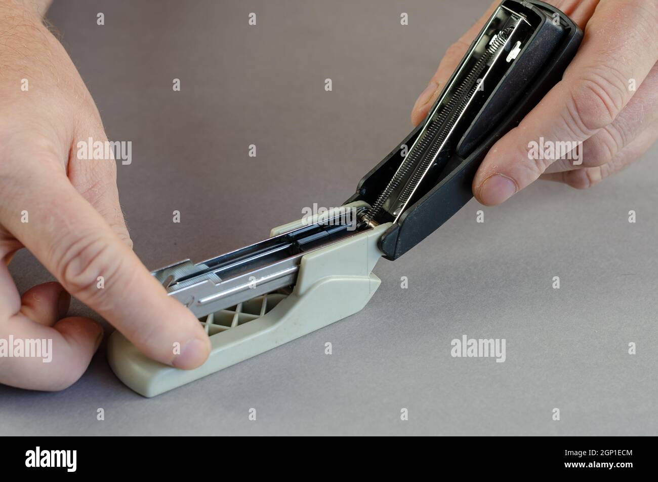 Man holding stapler close up hi-res stock photography and images - Alamy