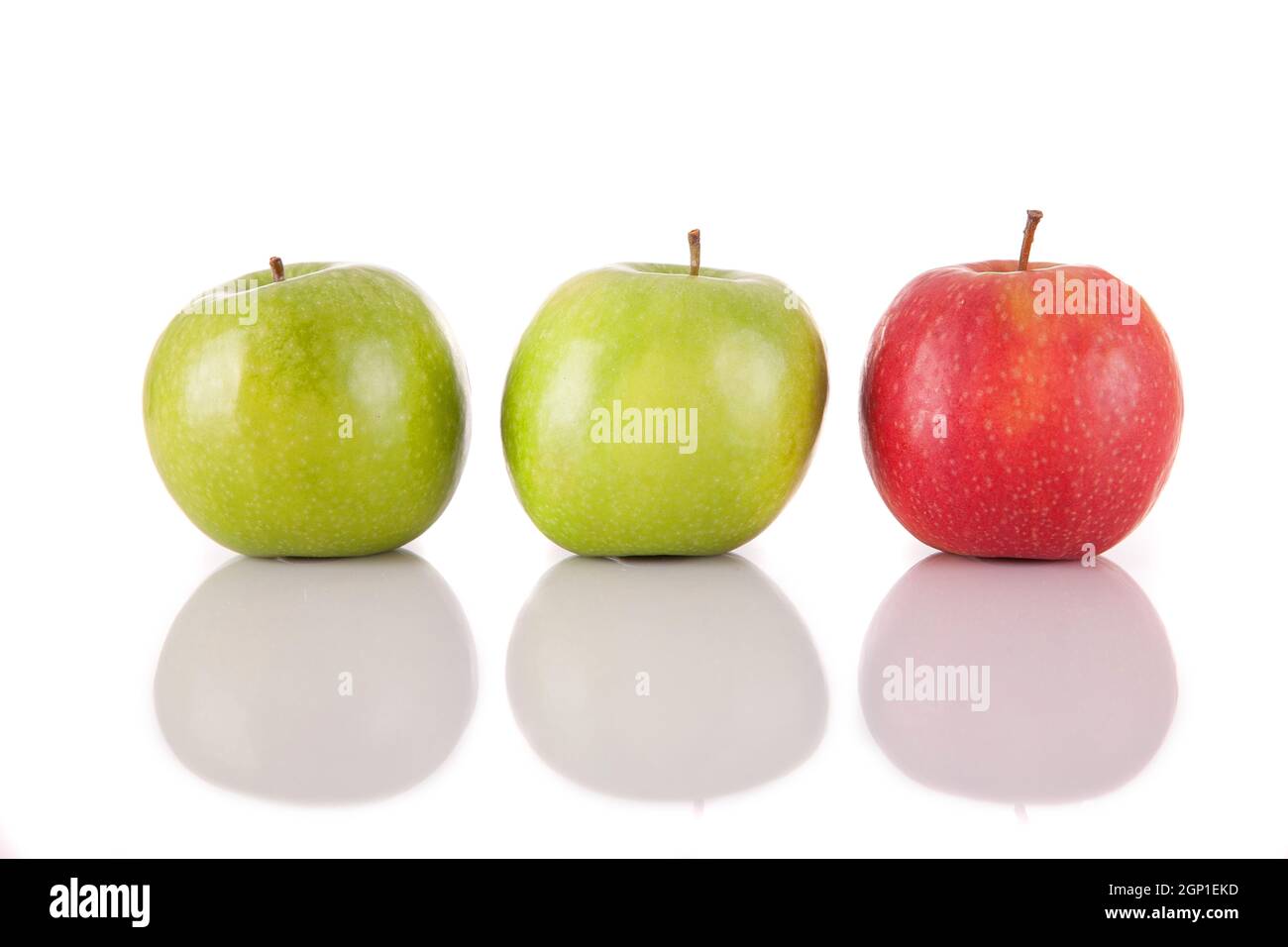 Red apple among green apples isolated on a white background Stock Photo ...
