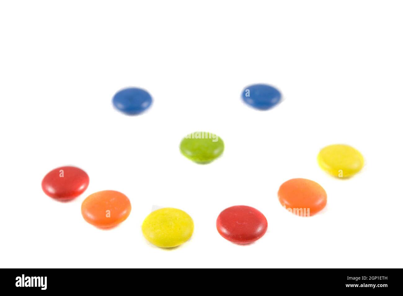 face made of colored smarties, isolated over white background Stock ...