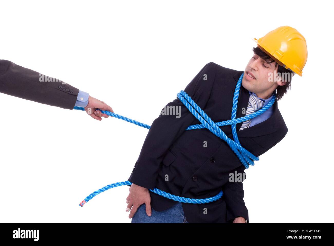 Businessman being pulled by a rope isolated over white Stock Photo - Alamy