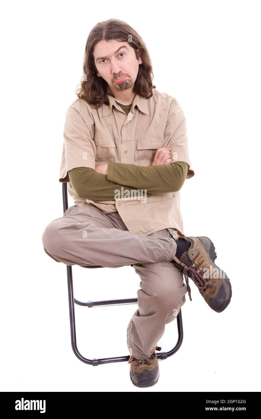 Sad man sitting on a chair, isolated over white Stock Photo - Alamy
