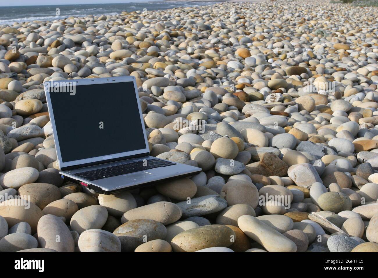 Personal Computer Isolated at the beach Stock Photo - Alamy