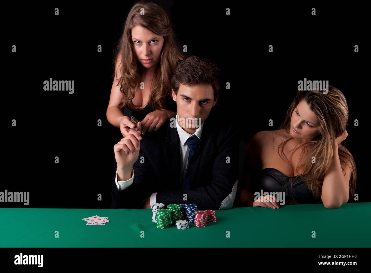 Young handsome man playing texas hold'em poker Stock Photo - Alamy