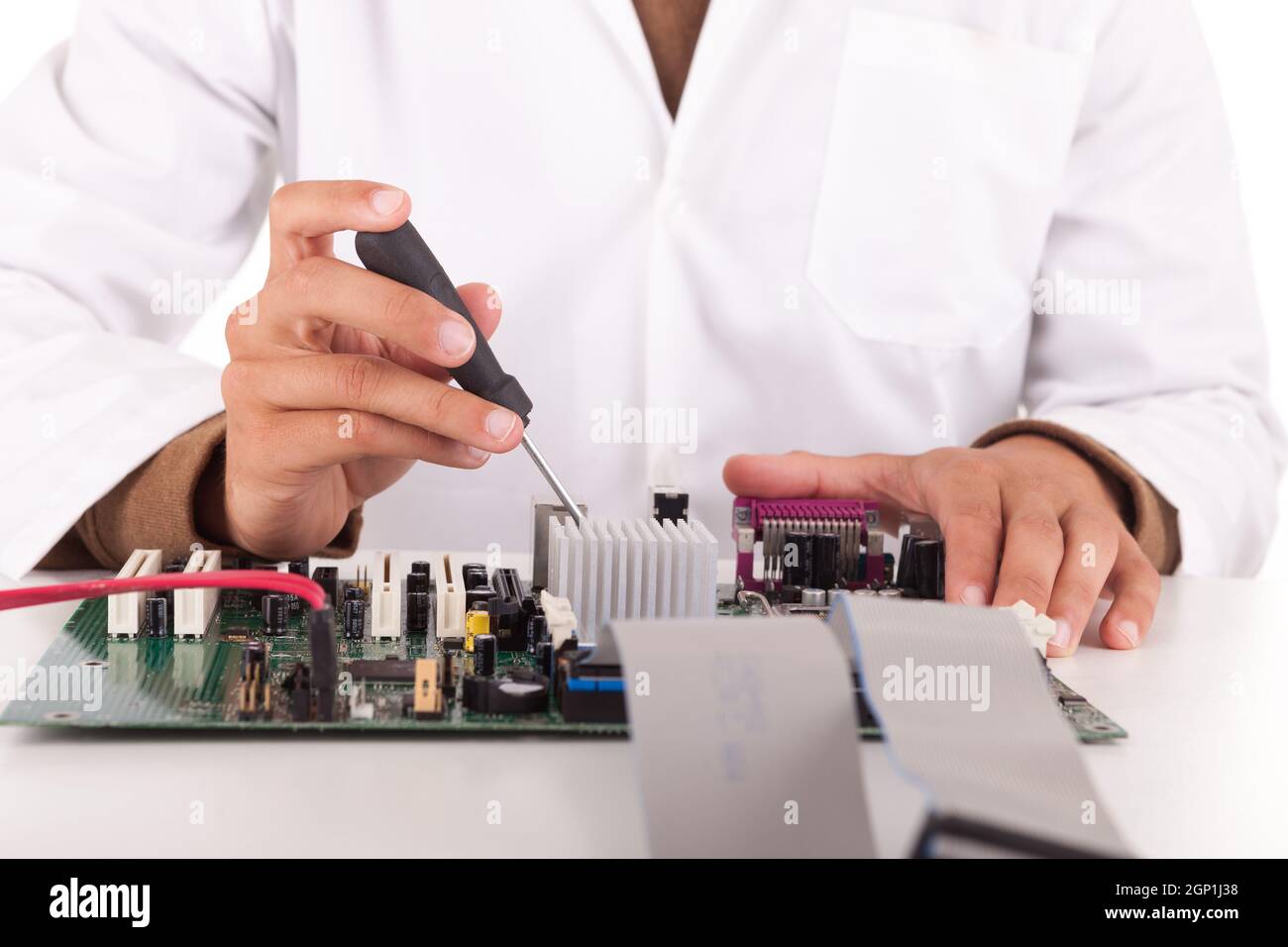 Happy and successful young computer engineer Stock Photo - Alamy