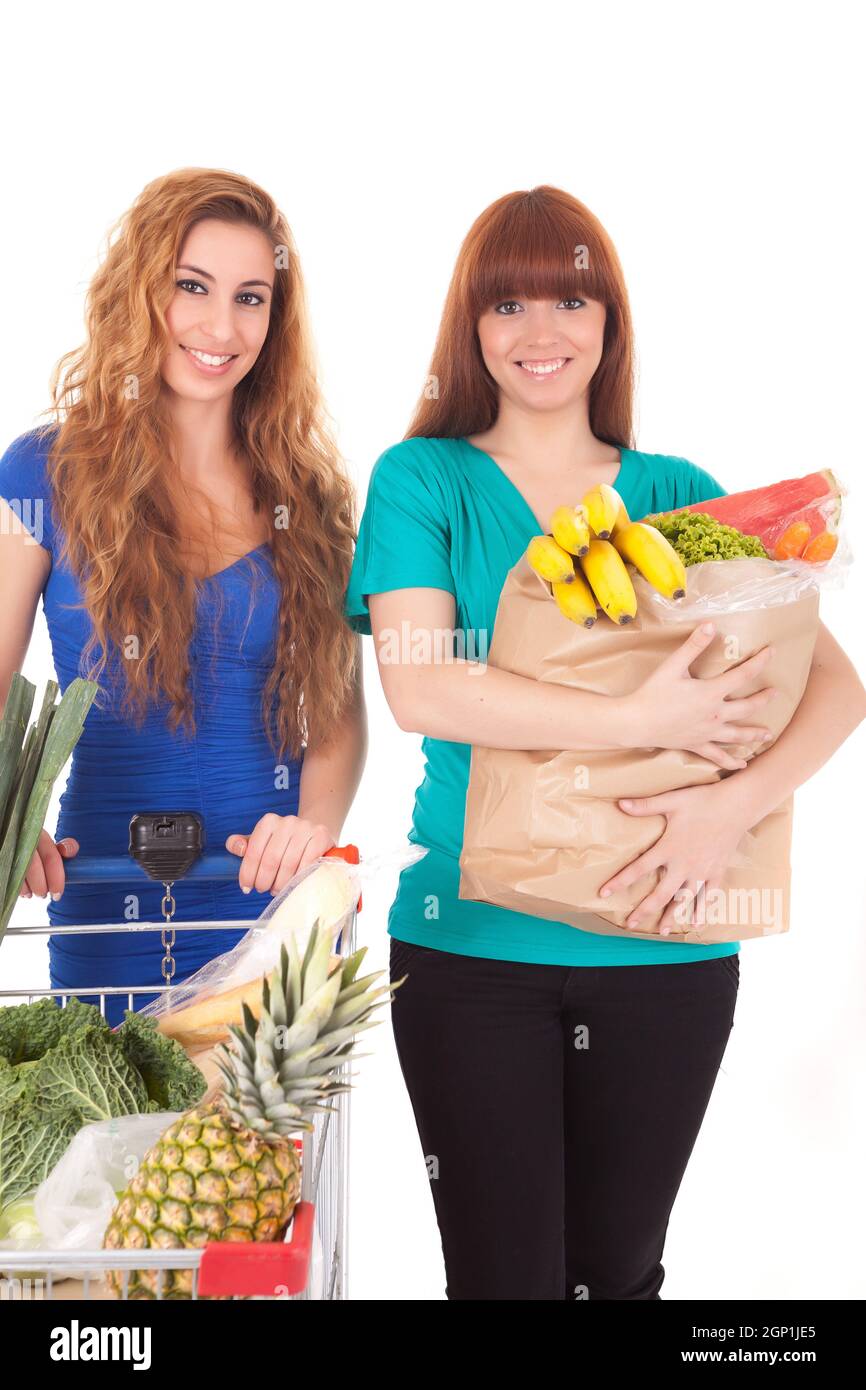 Beautiful young women shopping at the supermarket Stock Photo - Alamy