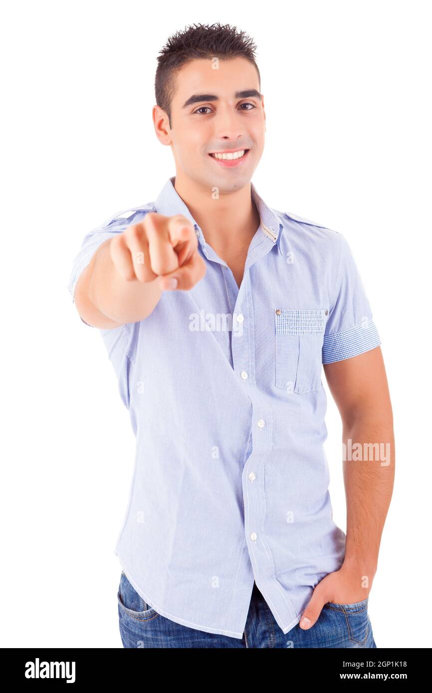 Studio shot of a handsome young man pointing forward Stock Photo - Alamy