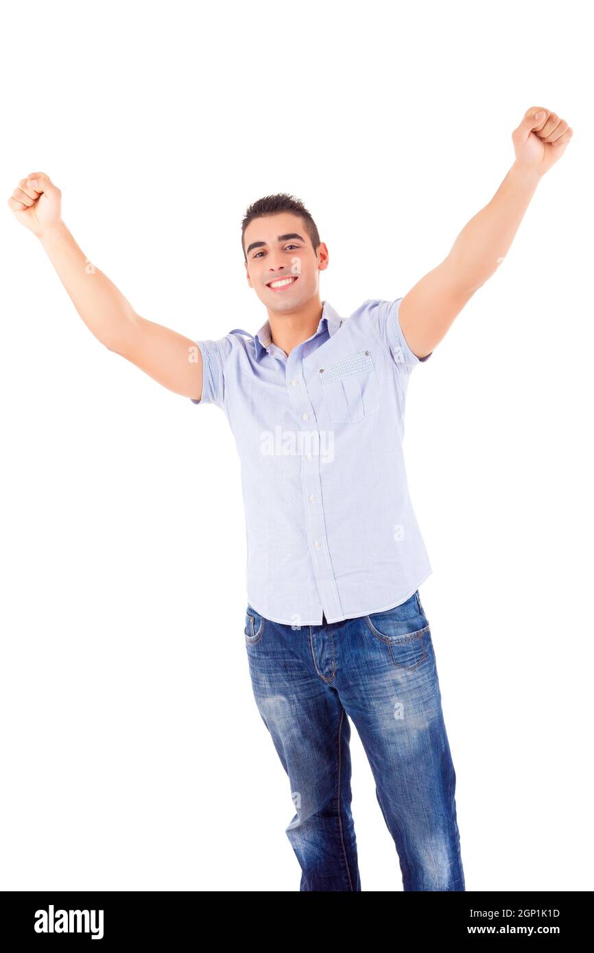 Studio picture of a happy young man with arms raised Stock Photo - Alamy