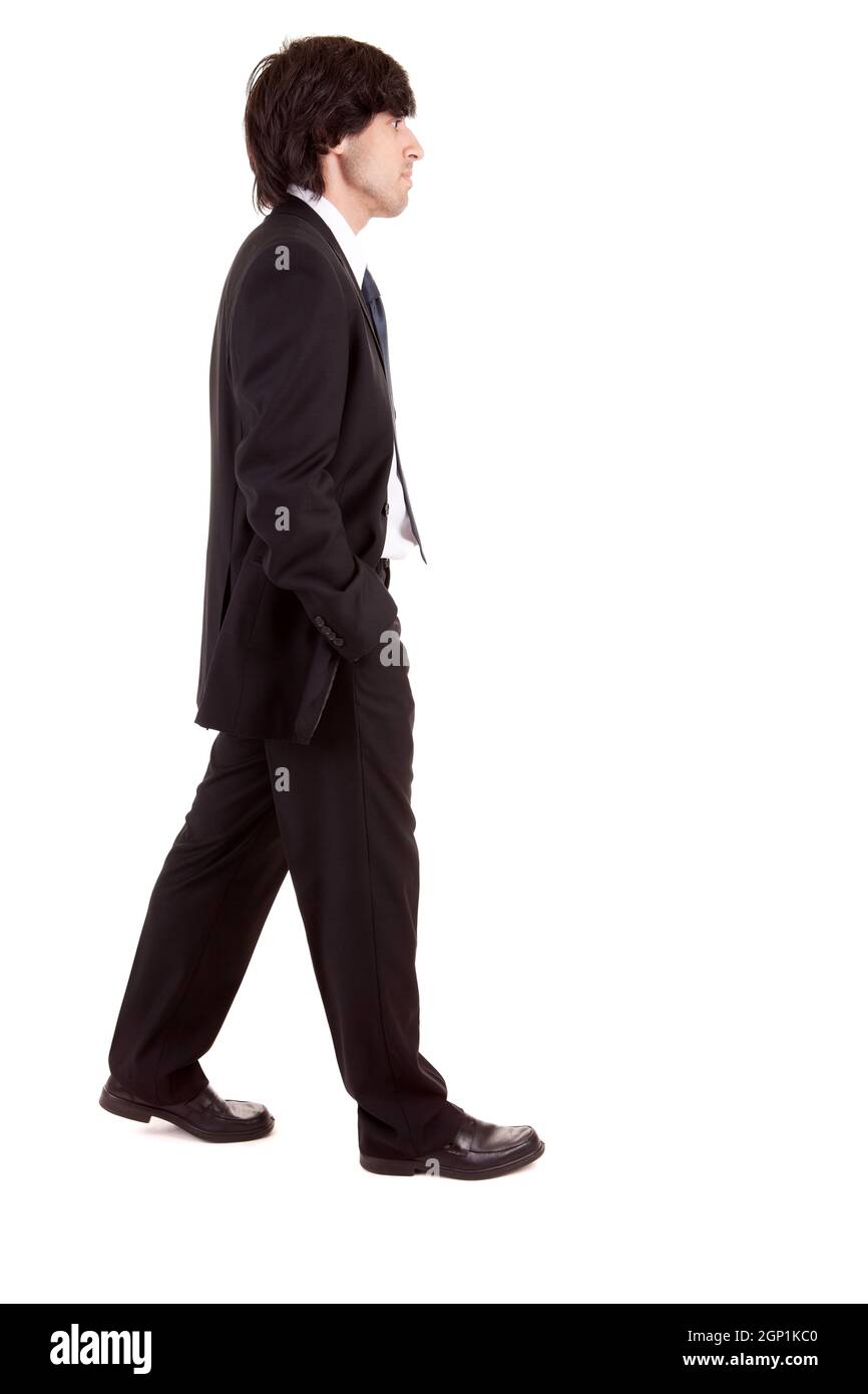 Young business man walking, isolated over white Stock Photo - Alamy