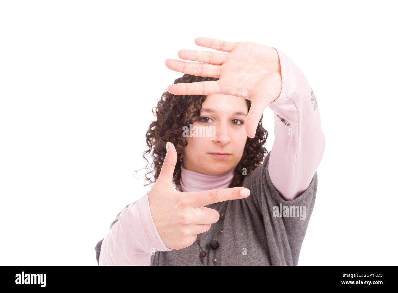 Young woman showing framing hand gesture - focus on hands Stock Photo ...