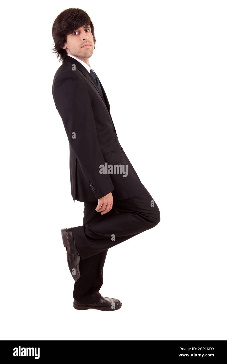 Business man leaning against wall, isolated over white Stock Photo - Alamy