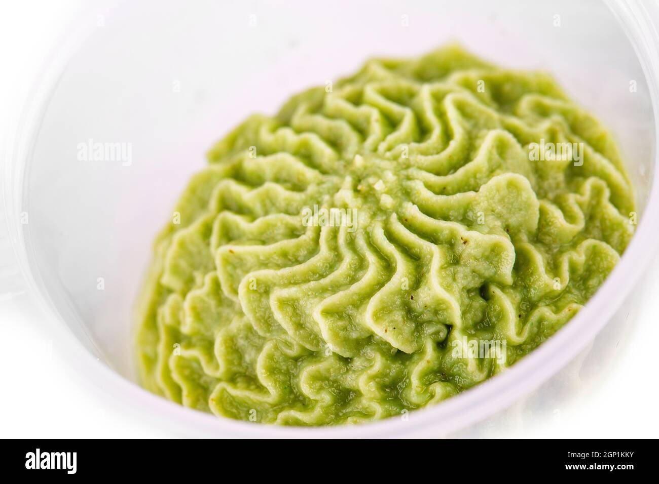 plastic container wasabi sauce on white background Stock Photo - Alamy