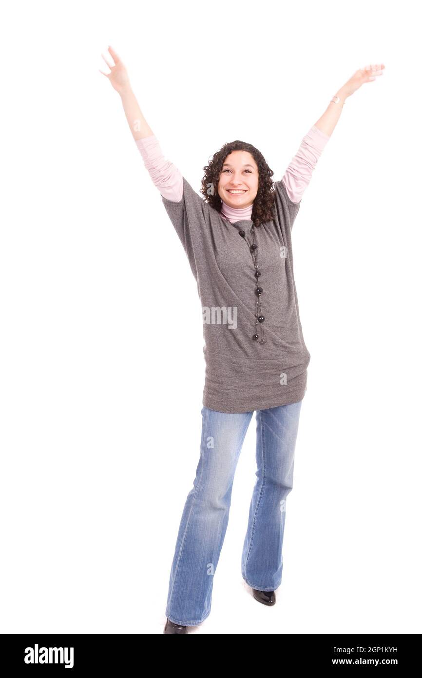 Very happy girl with arms raised, isolated over white Stock Photo - Alamy