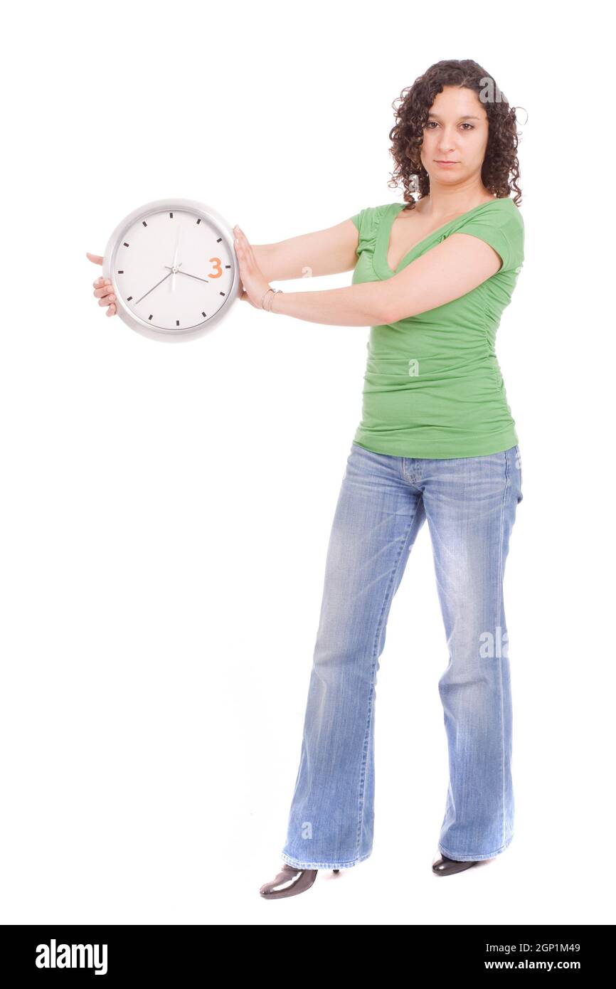 Woman holding clock over face hi-res stock photography and images - Alamy