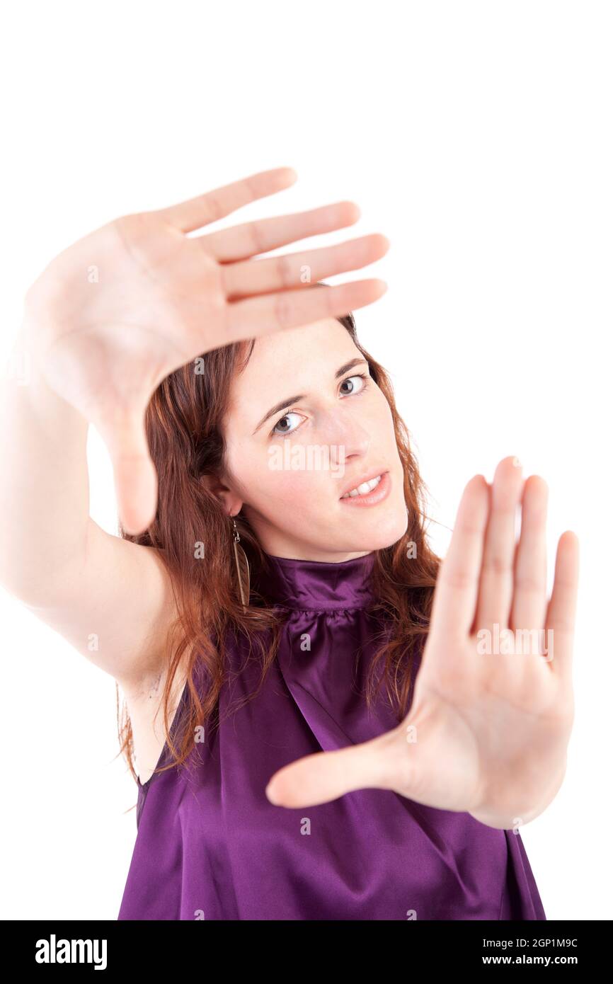 Woman showing framing hand gesture - focus on face Stock Photo - Alamy