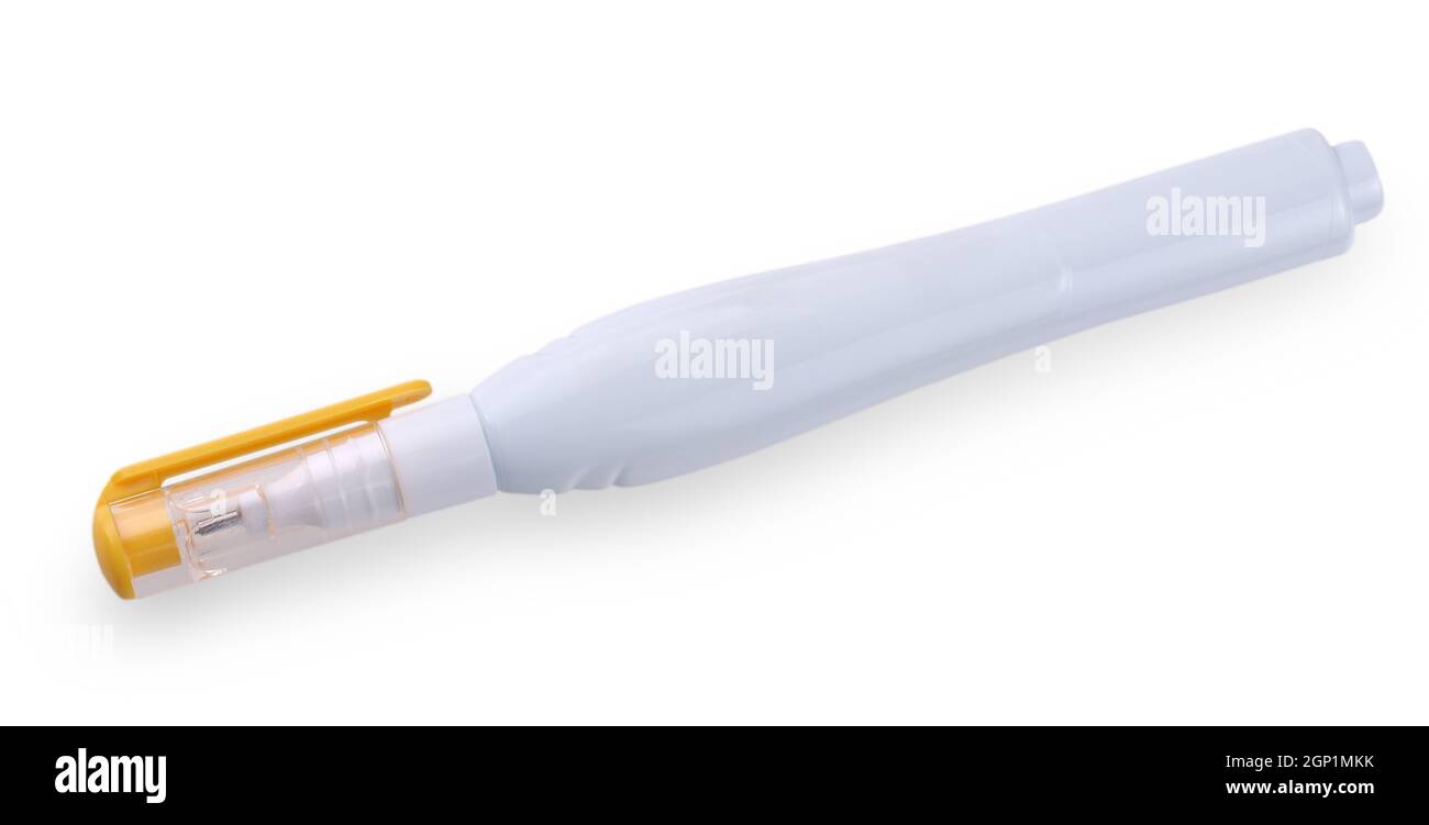 Yellow pen corrector on a white background Stock Photo - Alamy