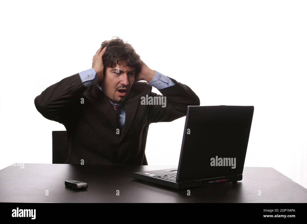 young man working with his personal computer Stock Photo - Alamy
