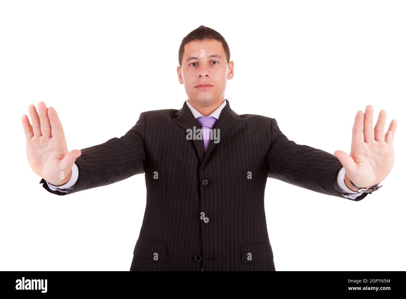 Business man making stop sign, isolated Stock Photo - Alamy