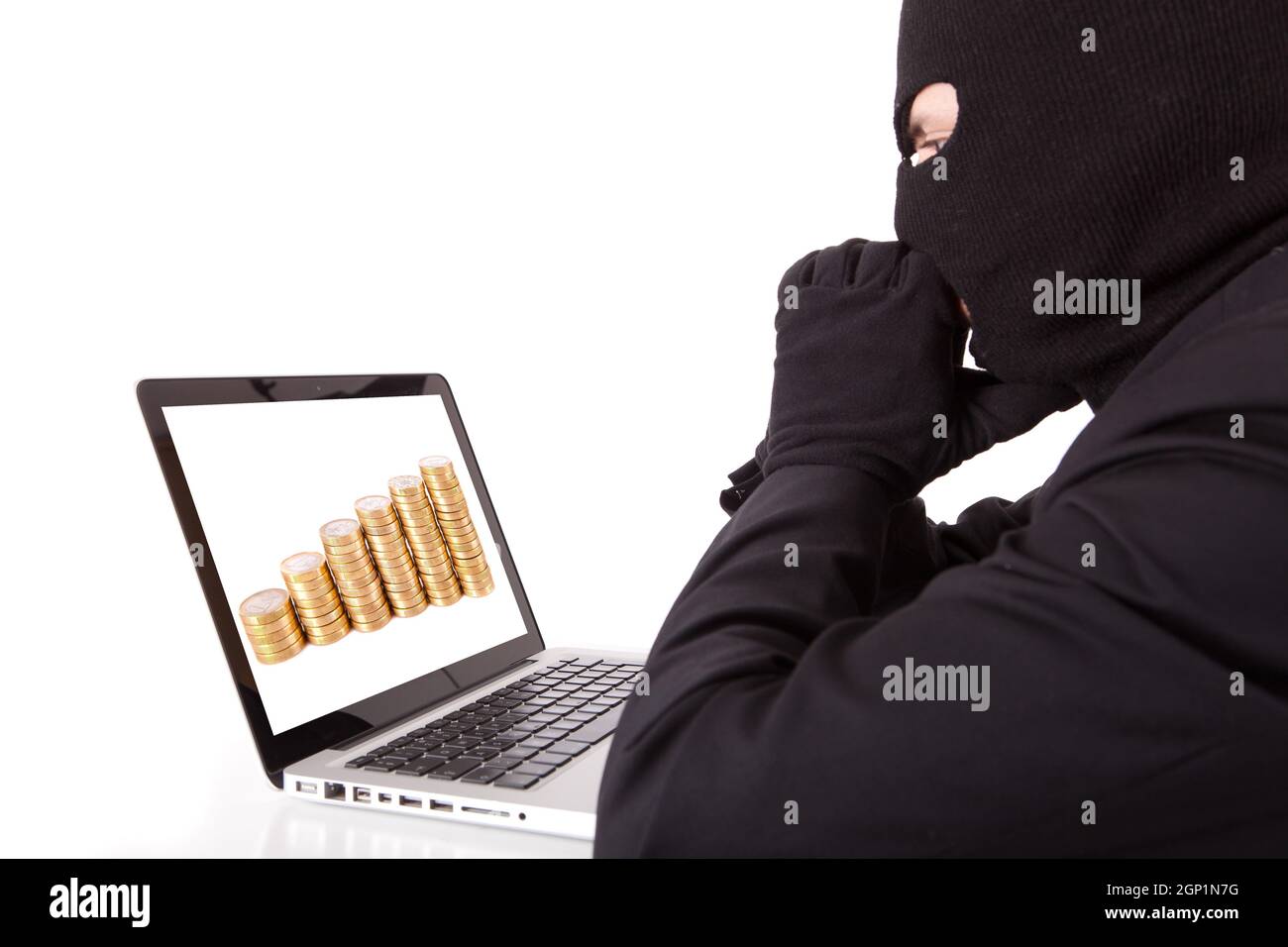 Disguised computer hacker hi-res stock photography and images - Alamy