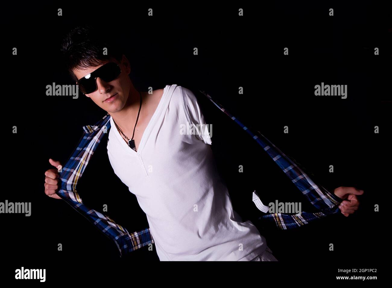 Young boy portrait - low key portrait Stock Photo - Alamy