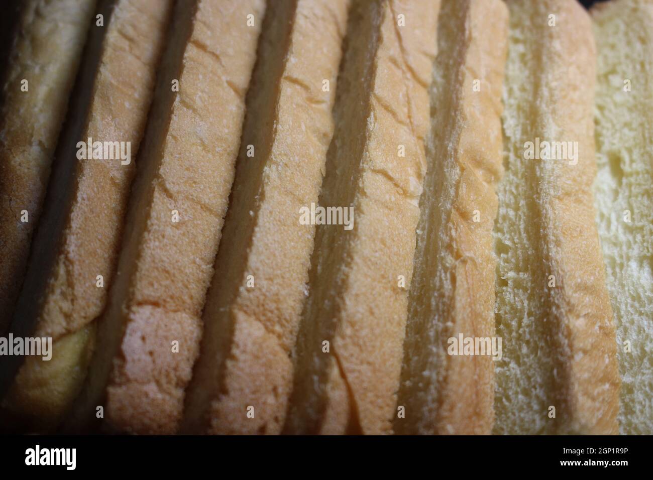 Closeup top view of freshly prepared slices of toast bread. Food ...