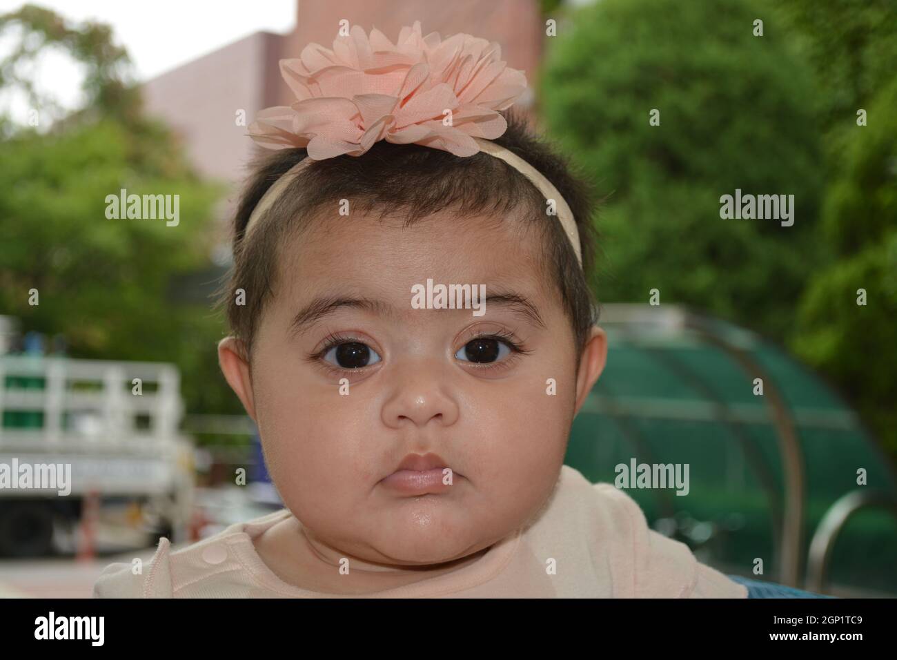 Infant girl making face hi-res stock photography and images - Alamy