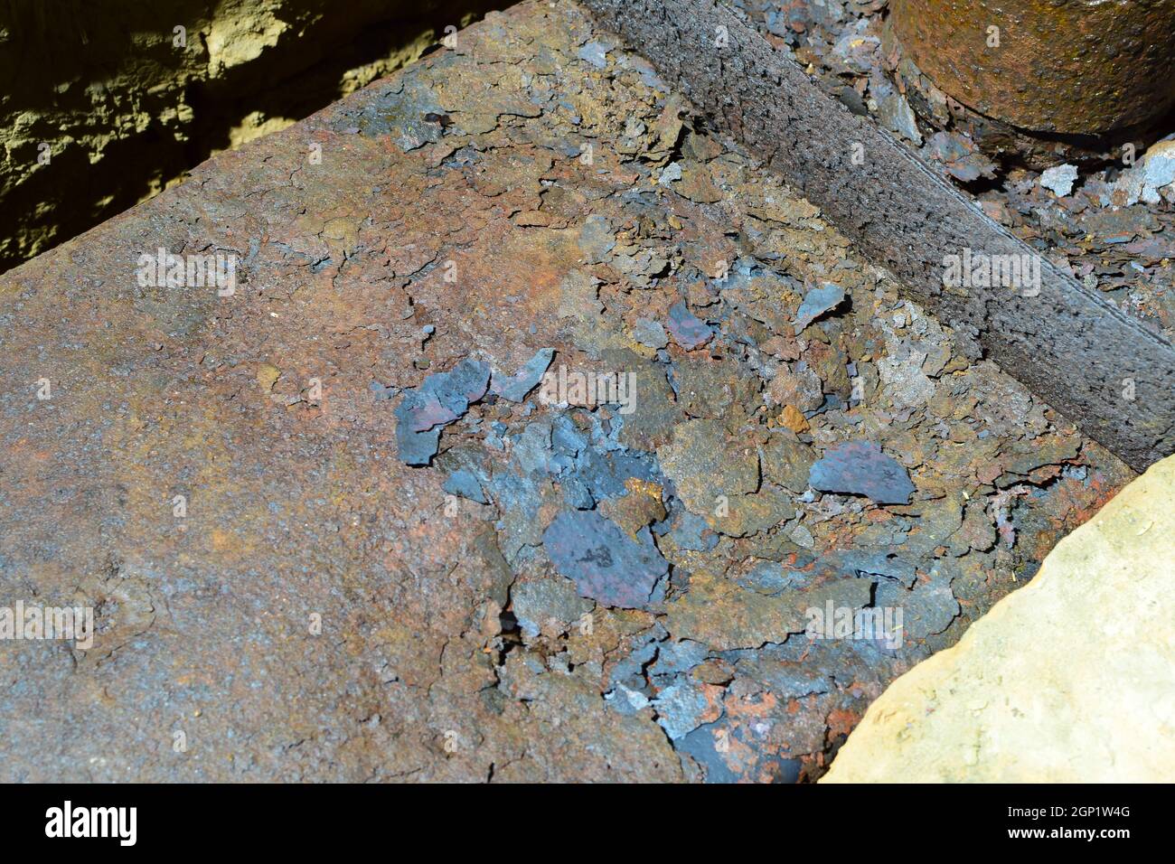 Flakes of rust on a sheet of rusty iron. Background of rust. Corrosion ...