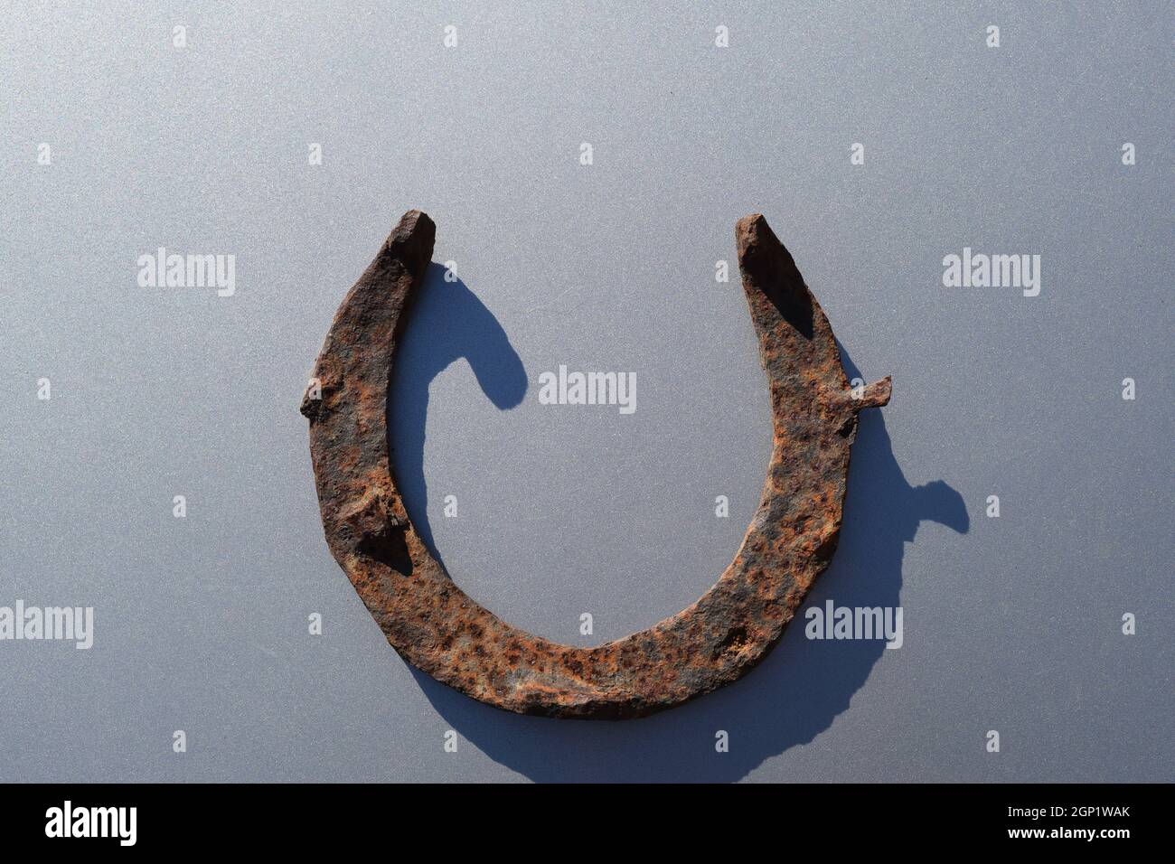 Old rusty horseshoe. Symbol for good luck and good fortune Stock Photo ...
