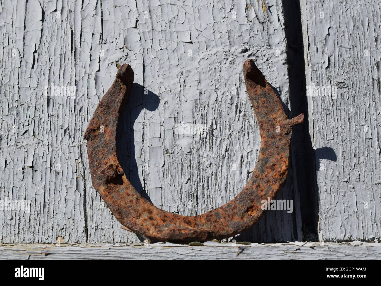 Old rusty horseshoe. Symbol for good luck and good fortune Stock Photo ...