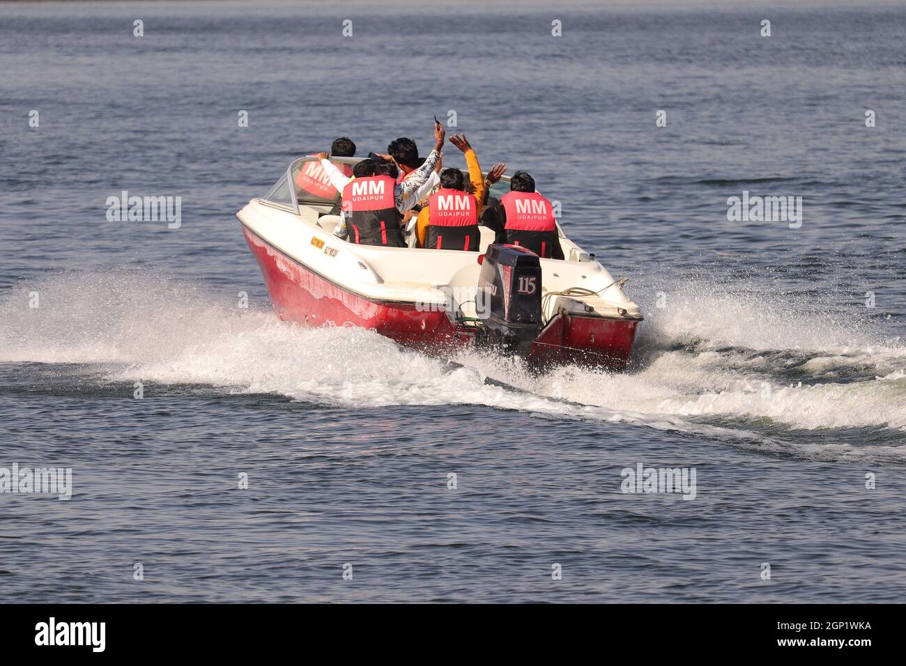 Udaipur, Rajasthan, India, December 29,2020: Speed boat with tourists ...