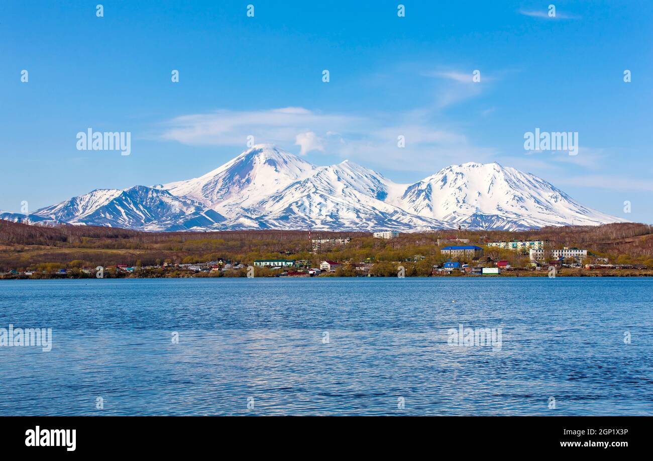 Avachinsky volcano towers over the city of Petropavlovsk-Kamchatsky ...