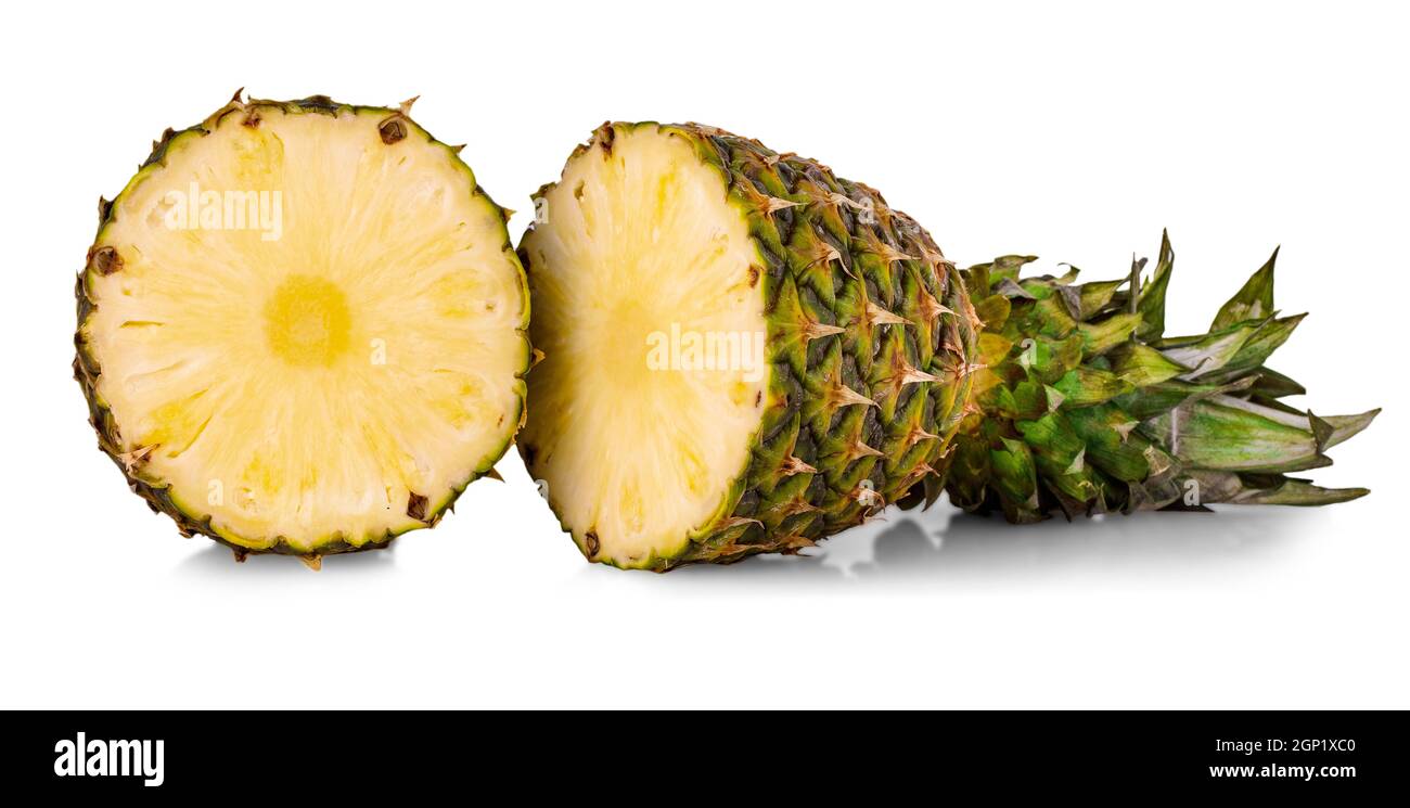 fresh pineapple cut in half on white background Stock Photo - Alamy