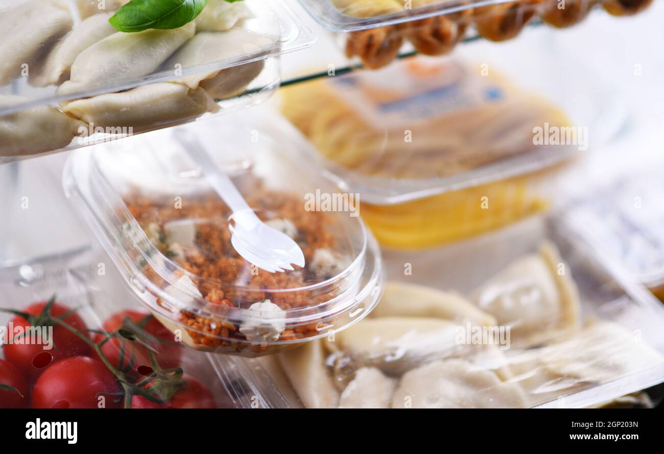 A variety of prepackaged food products in plastic boxes Stock Photo - Alamy