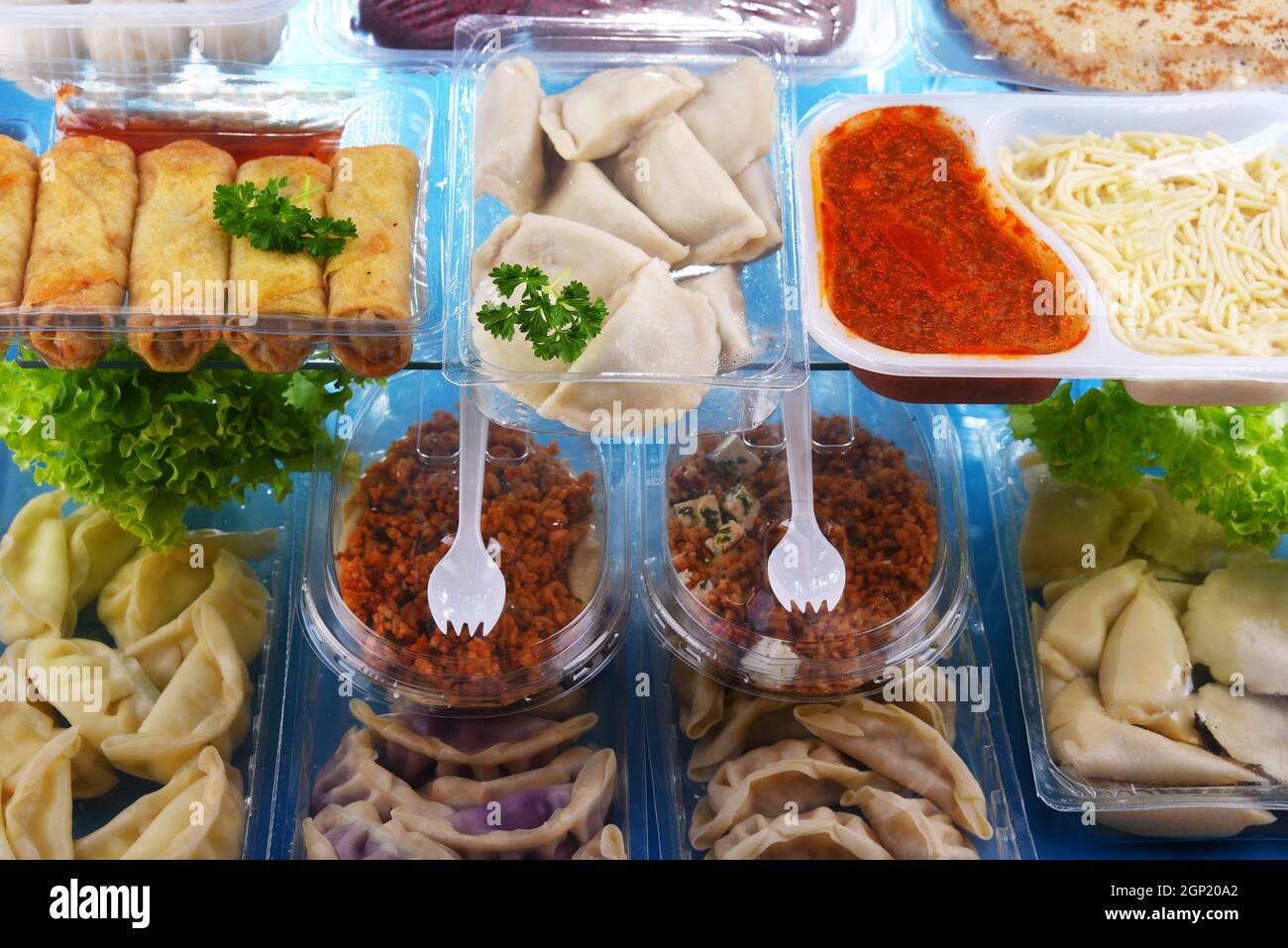 A variety of prepackaged food products in plastic boxes Stock Photo - Alamy