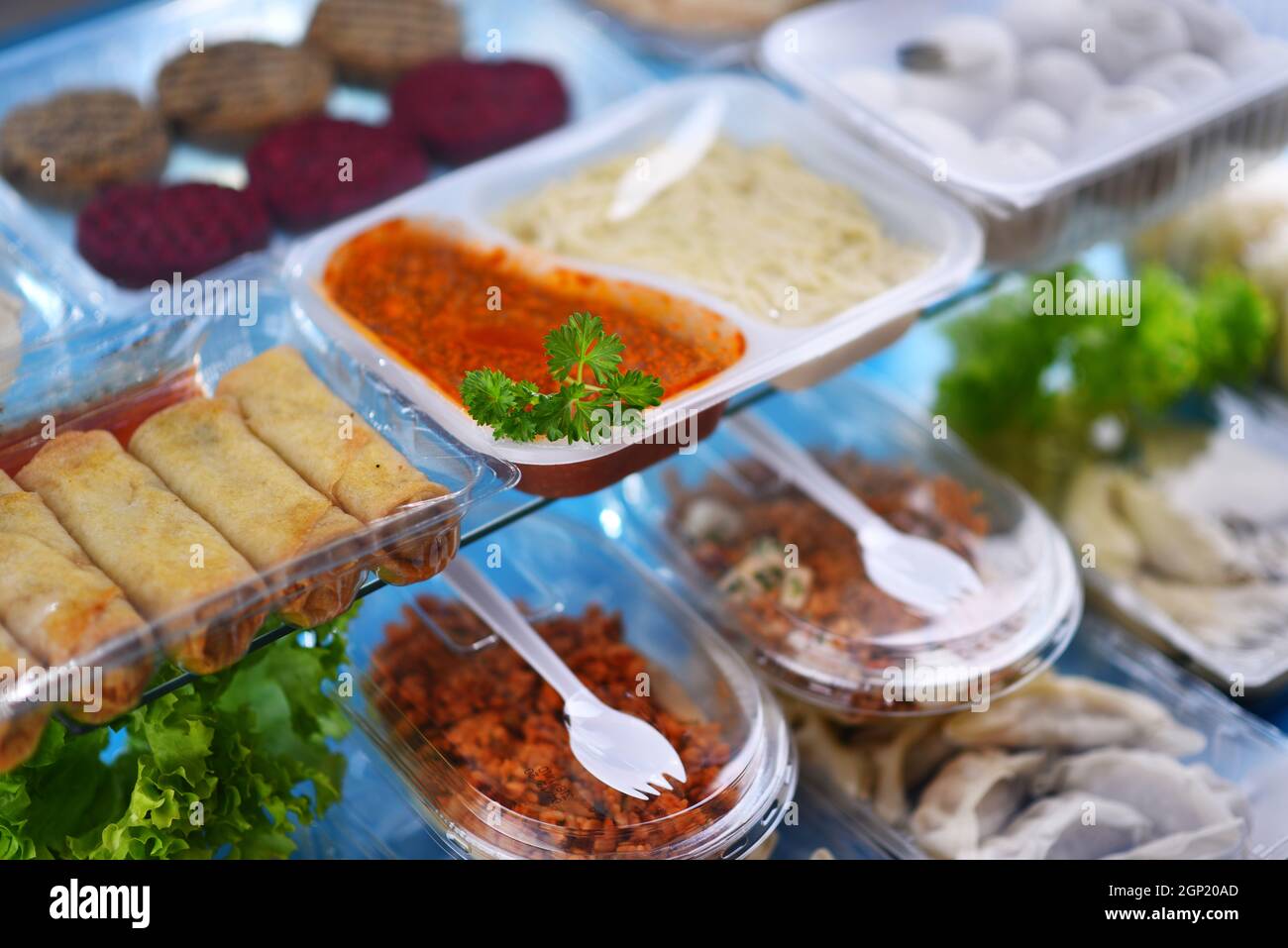 A variety of prepackaged food products in plastic boxes Stock Photo - Alamy
